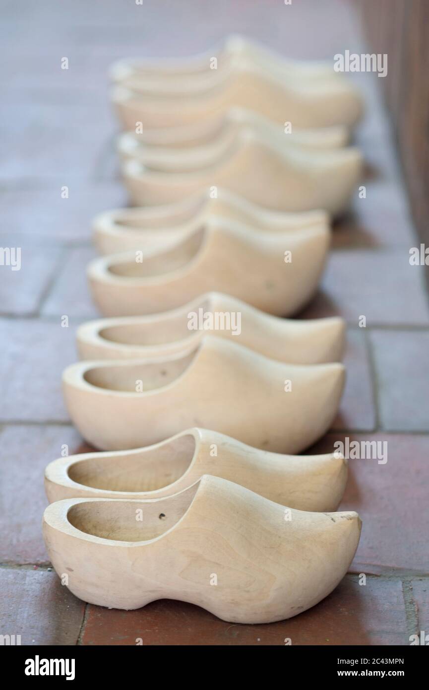 White clogs in a row Stock Photo - Alamy