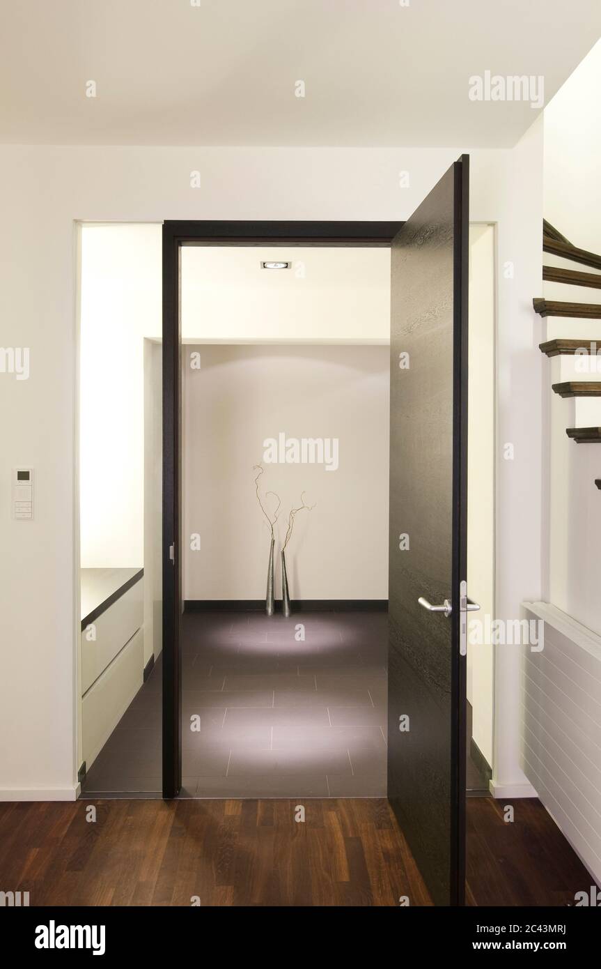 Open door in a modern apartment building Stock Photo - Alamy