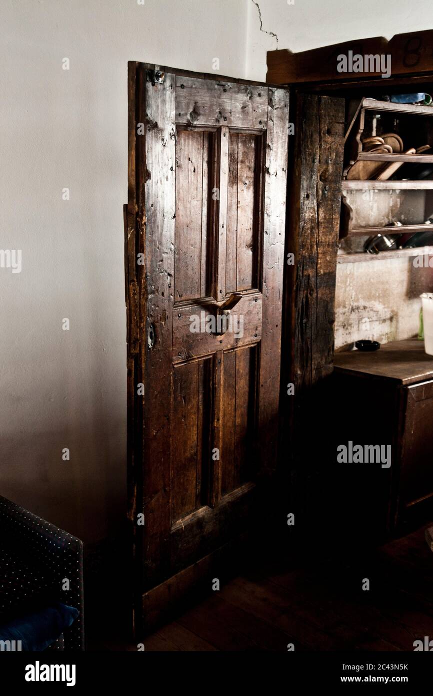Open wooden door in a rustic house Stock Photo - Alamy