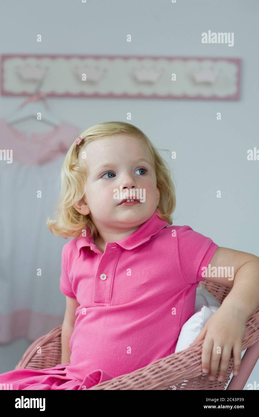 Blonde girl turns around Stock Photo - Alamy