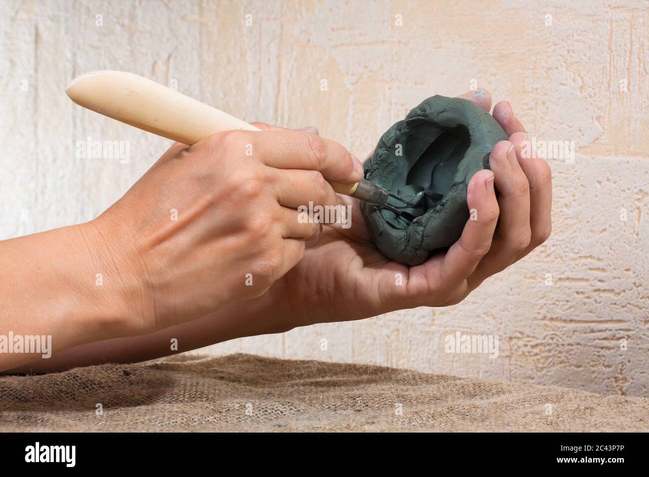 Craftsman working clay hi-res stock photography and images - Alamy