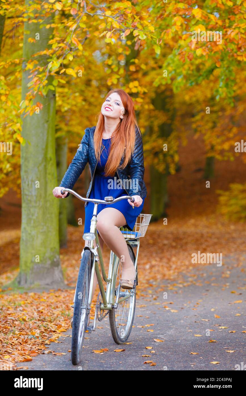 Nature, outdoors concept. Young girl on the way to autumn. Pretty woman ...