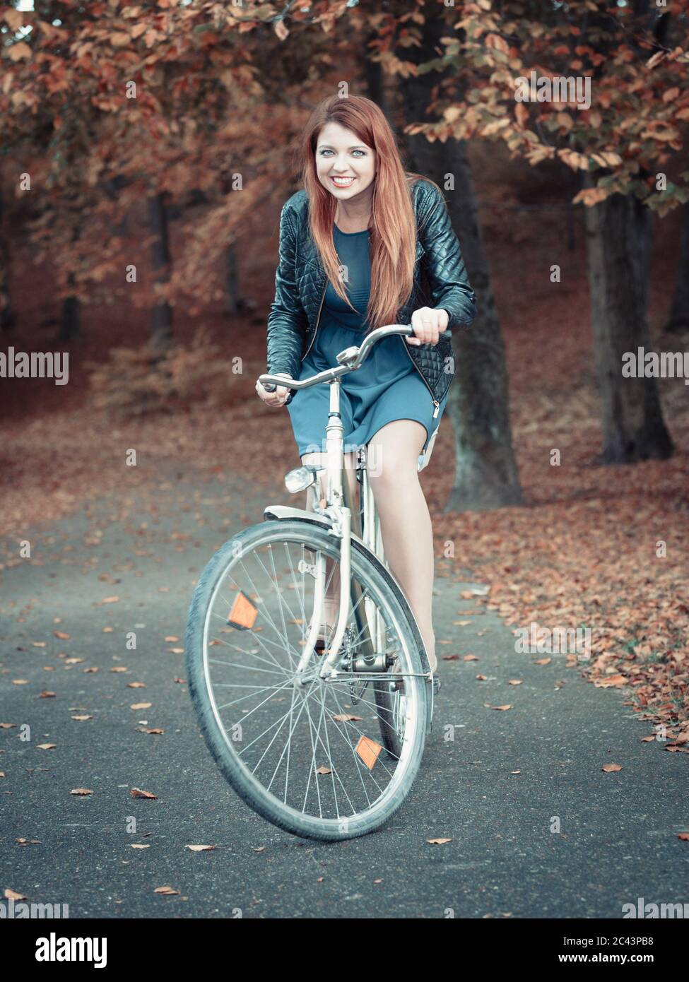 Woodland nature outdoor fitness relax leisure concept. Redhead lady ...