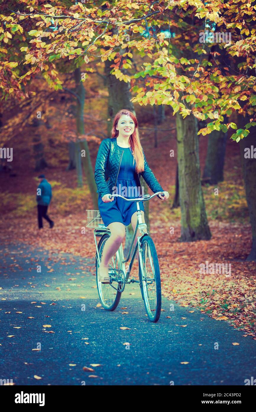 Woodland nature outdoor fitness relax leisure concept. Redhead lady ...