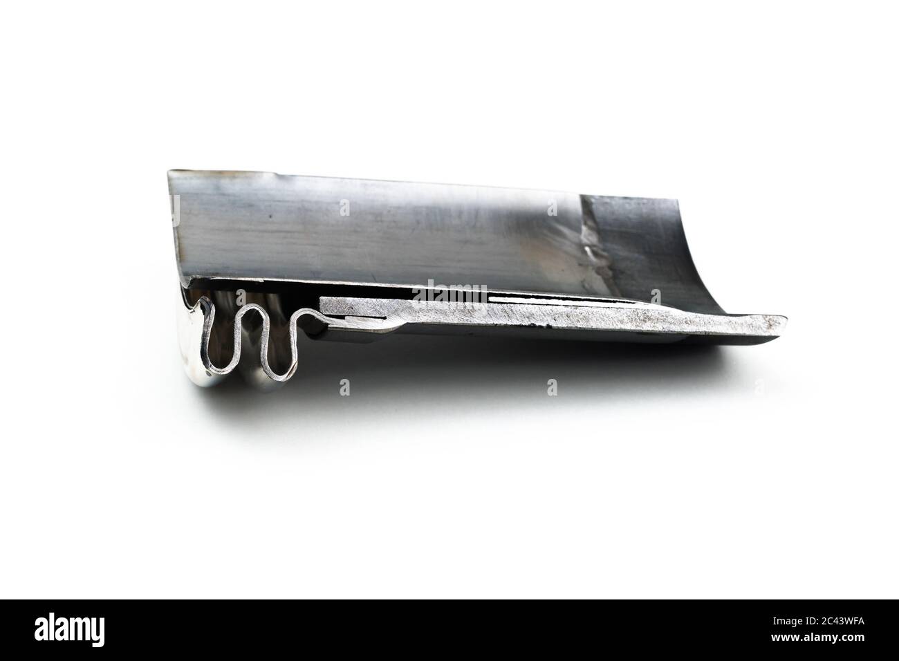 Section of bellows metal compensator isolated on white background. High ...