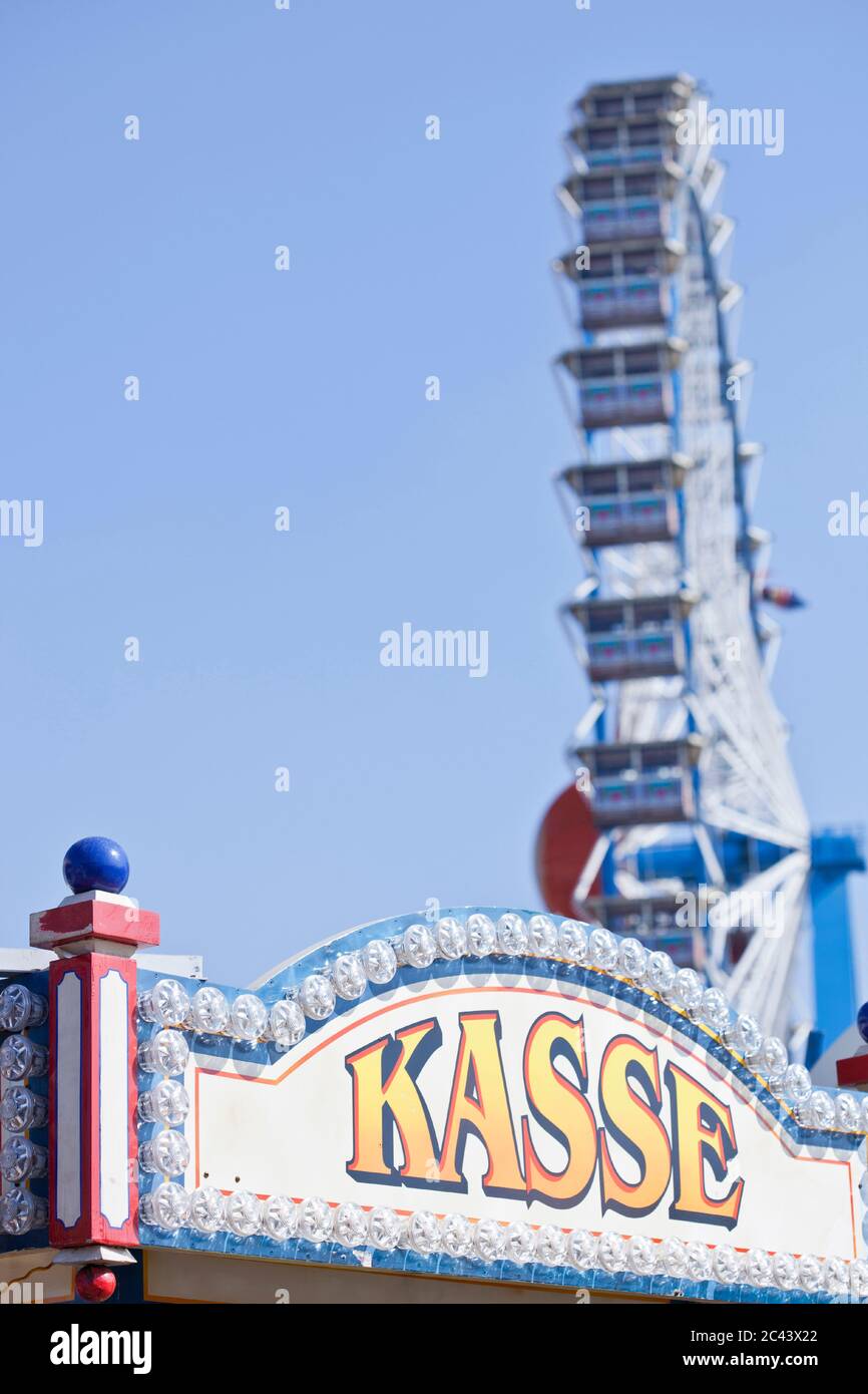 Ticket booth in front of the ferris wheel at the Oktoberfest in Munich ...