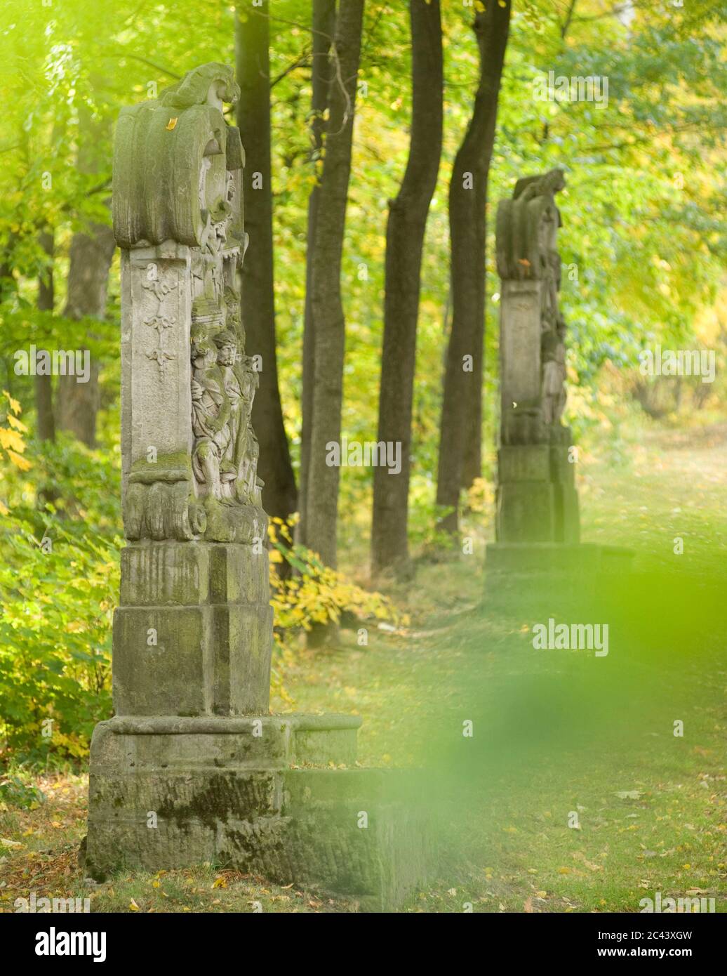 Two stone sculptures in the forest Stock Photo - Alamy