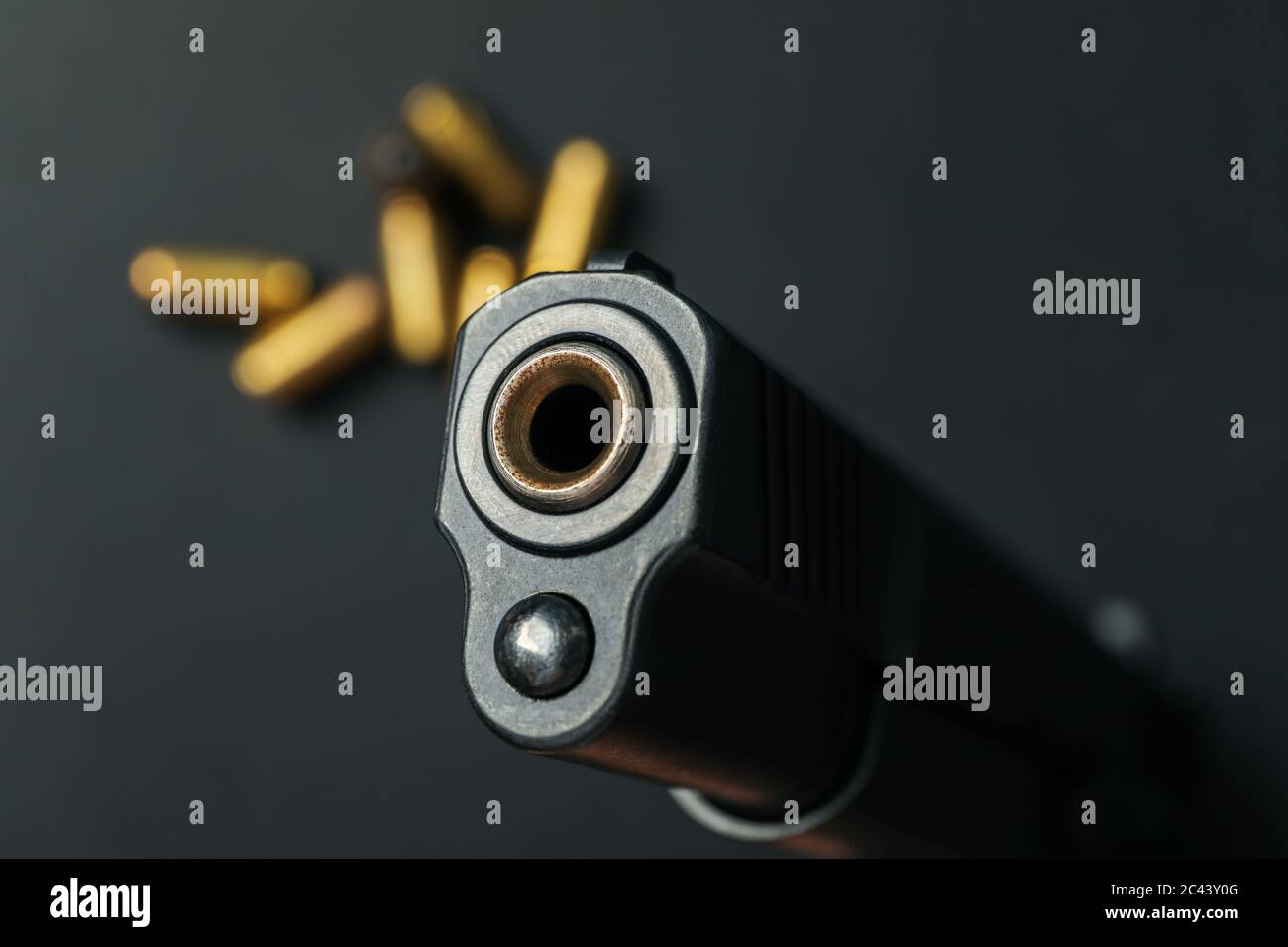 Pistol and bullets on black background. Self defense weapon Stock Photo ...