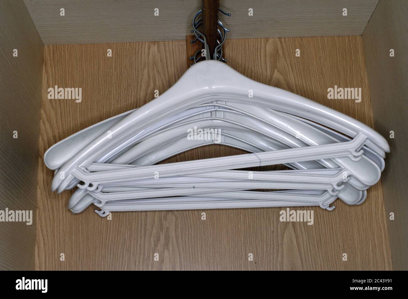Empty closet with hangers Stock Photo - Alamy