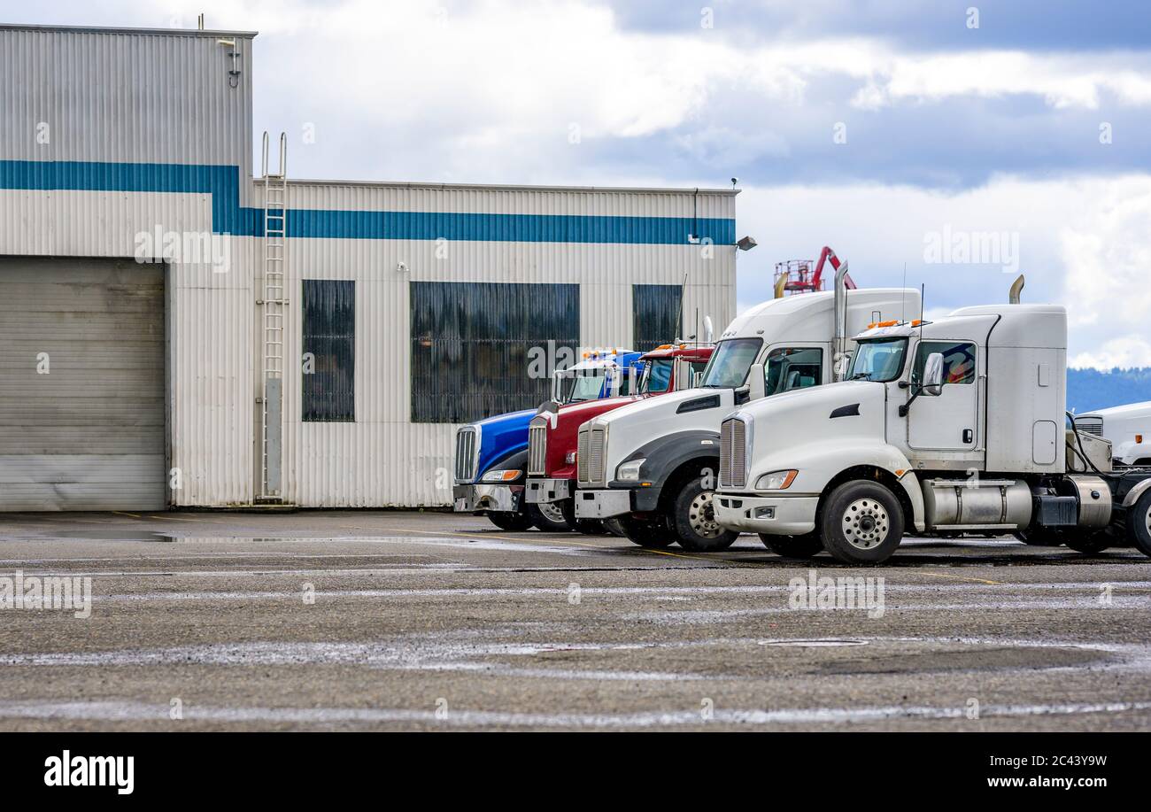 Different makes, models and colors Big rigs long haul industrial ...