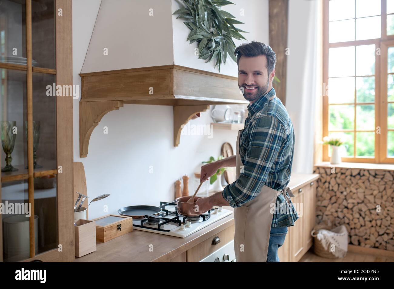 Bearded man cook in hi-res stock photography and images - Alamy