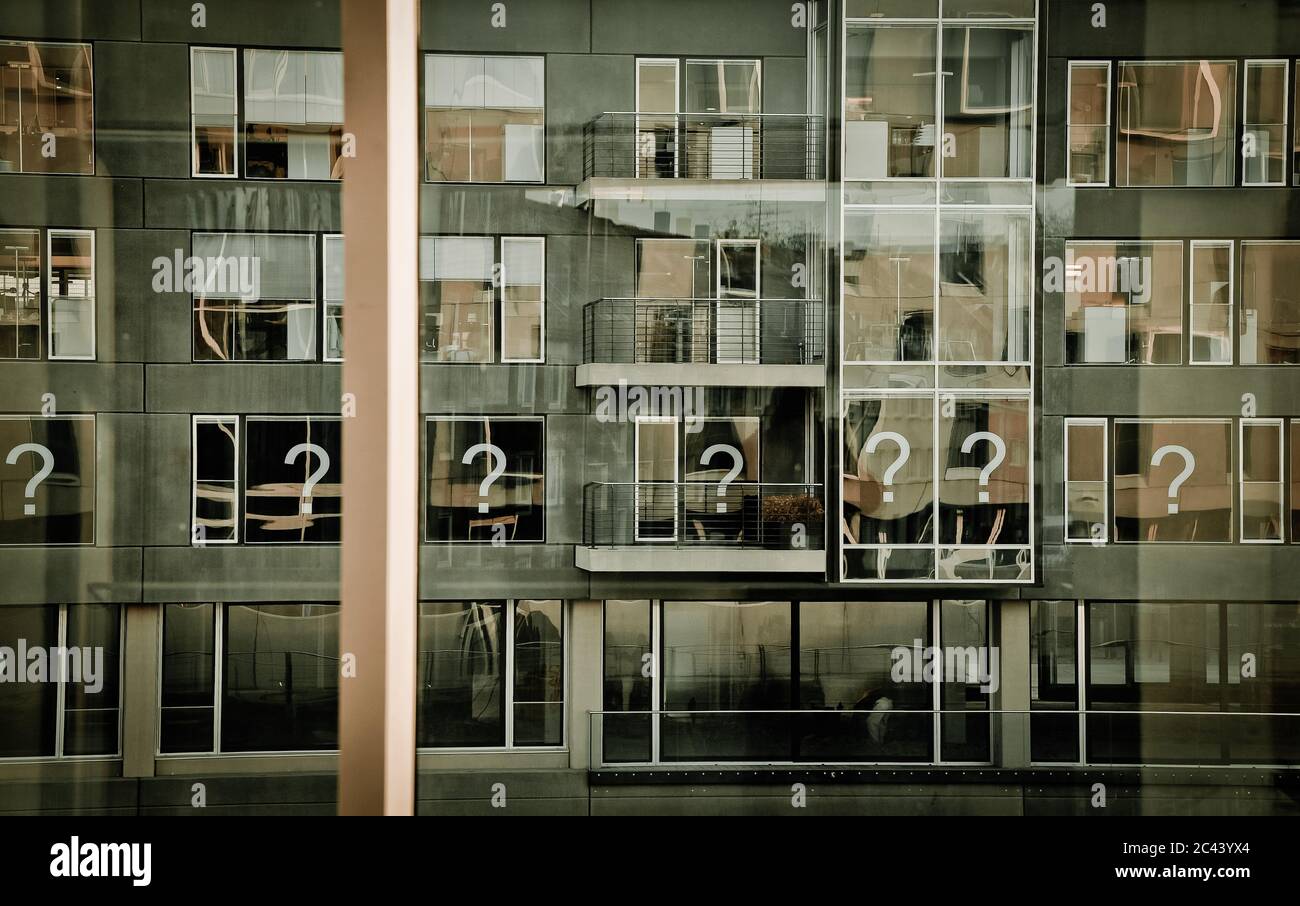 Question mark on the facade of a building Stock Photo - Alamy