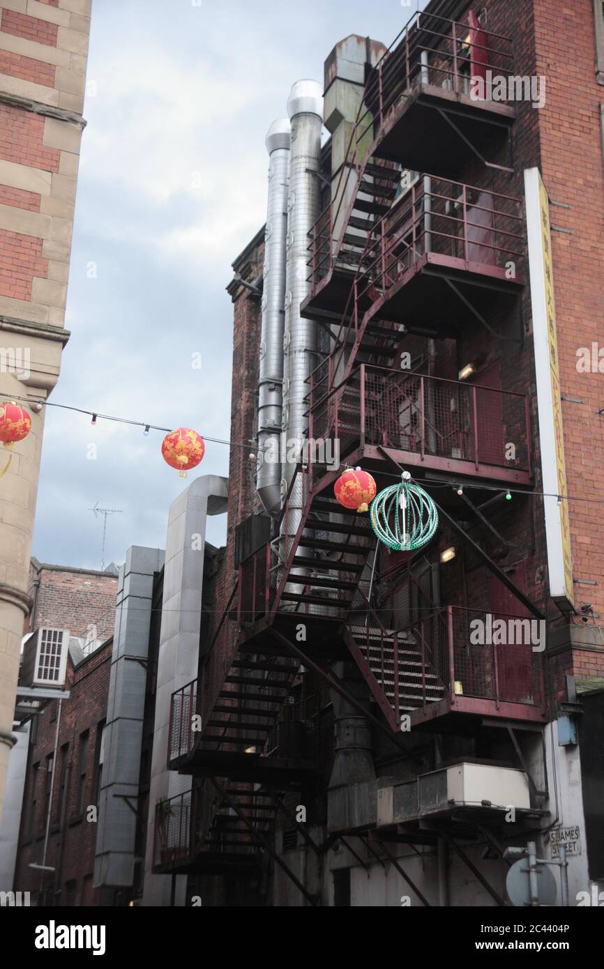 Fire escape in a back lane (St. James Street) in Chinatown, Manchester ...