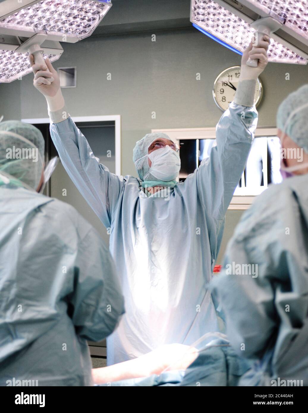 Surgeons during an operation Stock Photo - Alamy