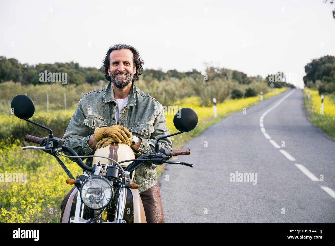 Bearded biker on motorcycle hi-res stock photography and images - Alamy