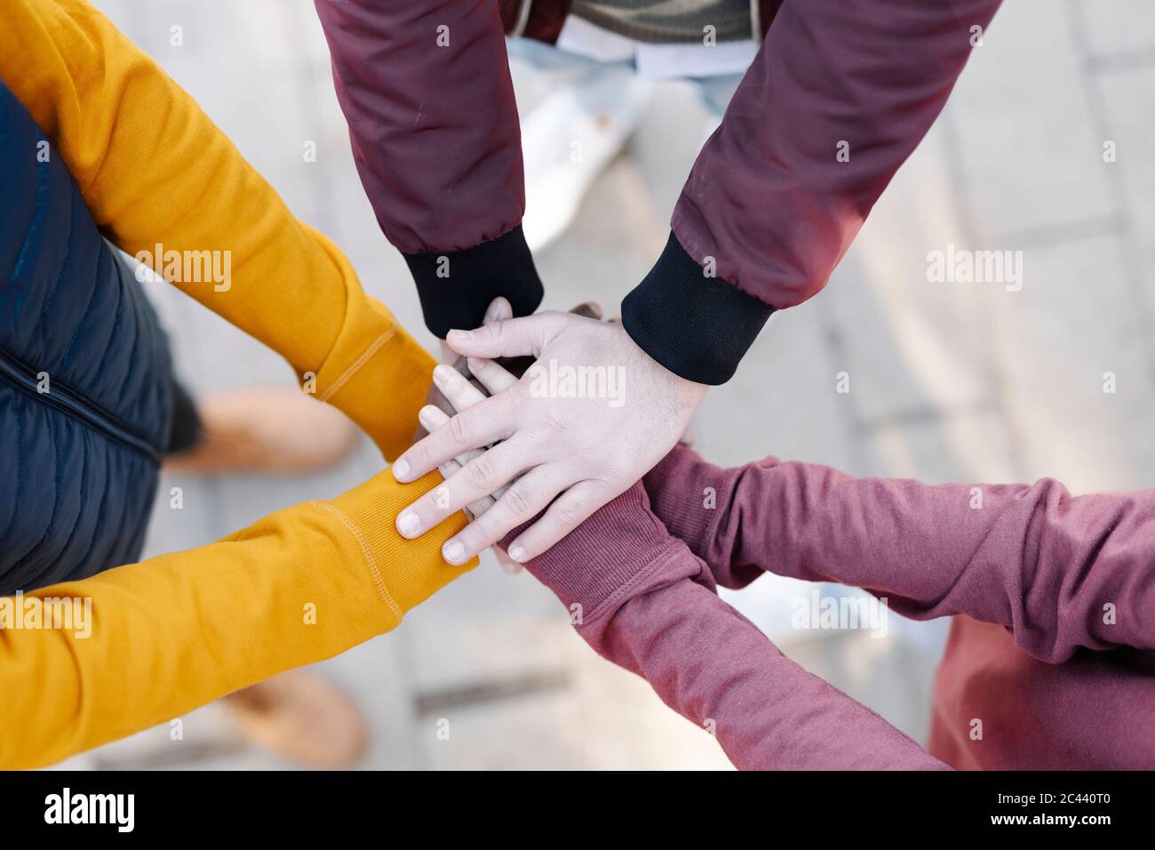 Close-up of friends stacking their hands Stock Photo - Alamy