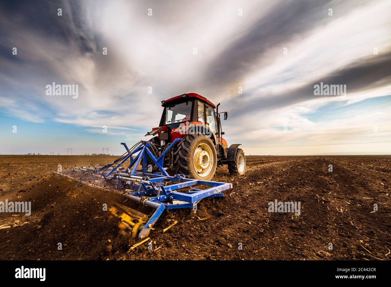 Farmer ploughing the land hi-res stock photography and images - Alamy