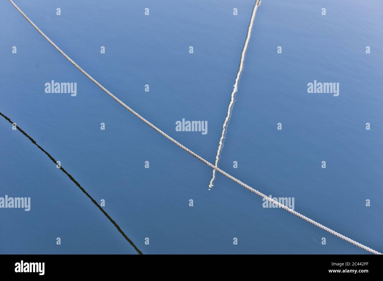 Rope over water Stock Photo - Alamy