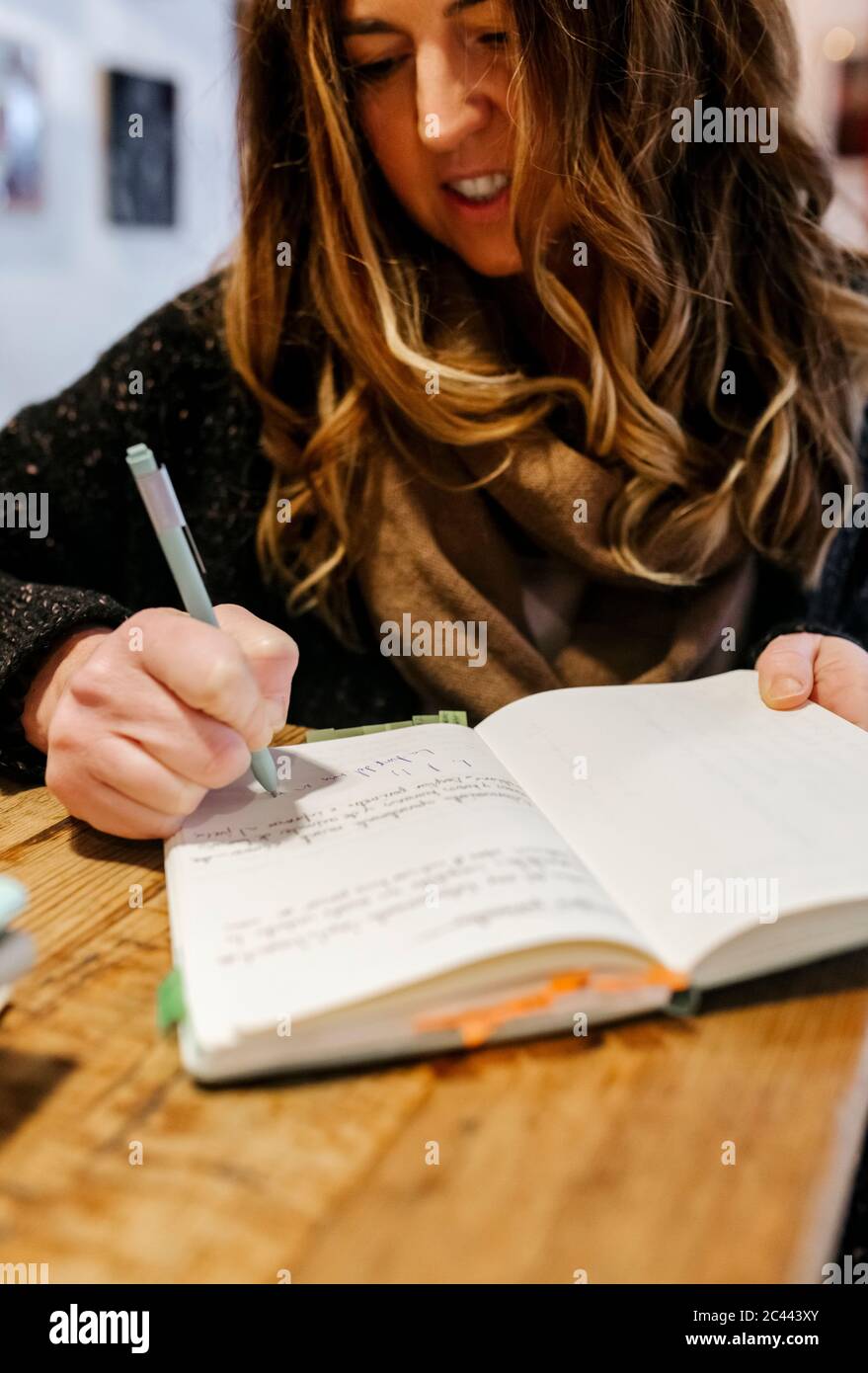 Beautiful woman writing notebook hi-res stock photography and images ...