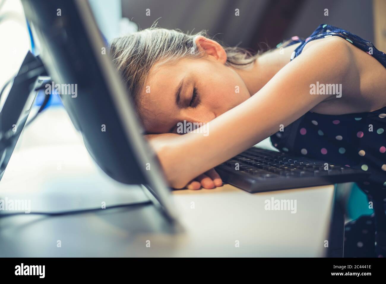 Teenage girl falling asleep while using computer hi-res stock ...