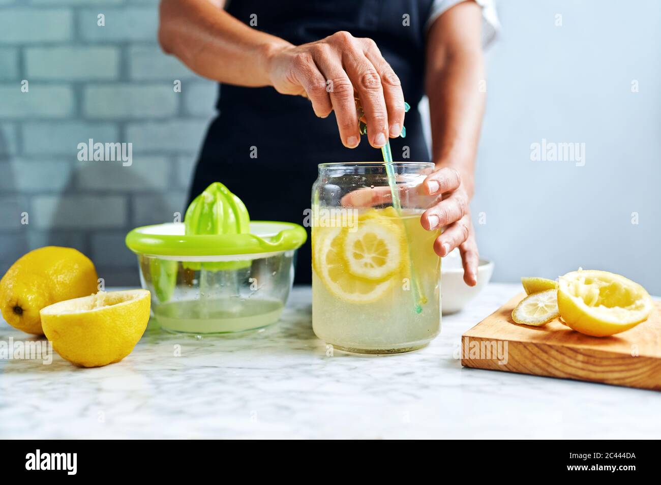 Hand stirring lemonade hi-res stock photography and images - Alamy