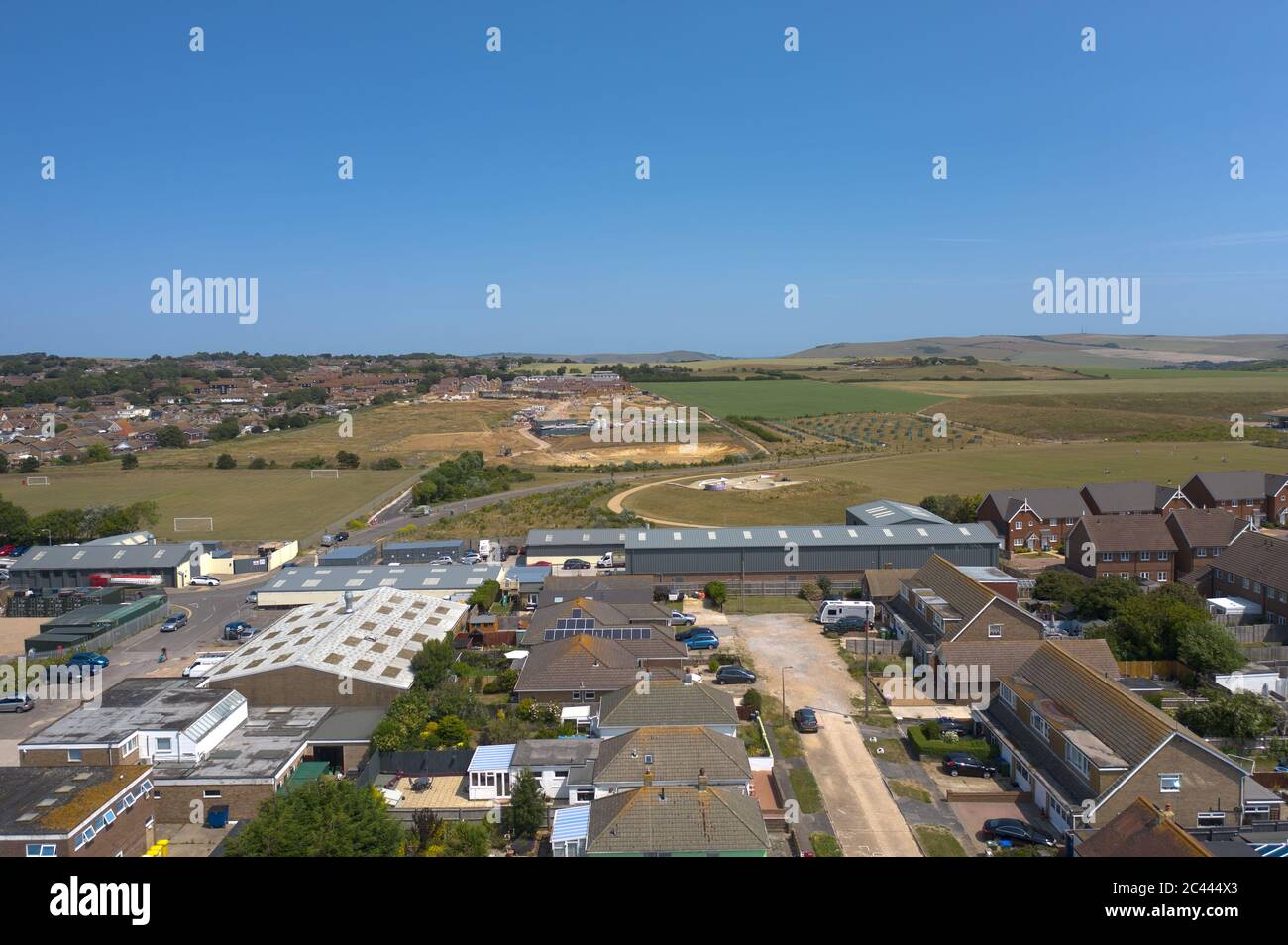 Aerial view over Peacehaven in East Sussex looking north towards the ...