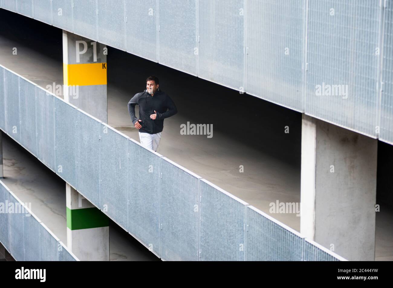 Running car man hi-res stock photography and images - Alamy