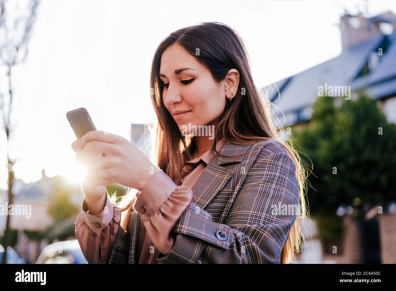 Woman looking down her nose hi-res stock photography and images - Alamy