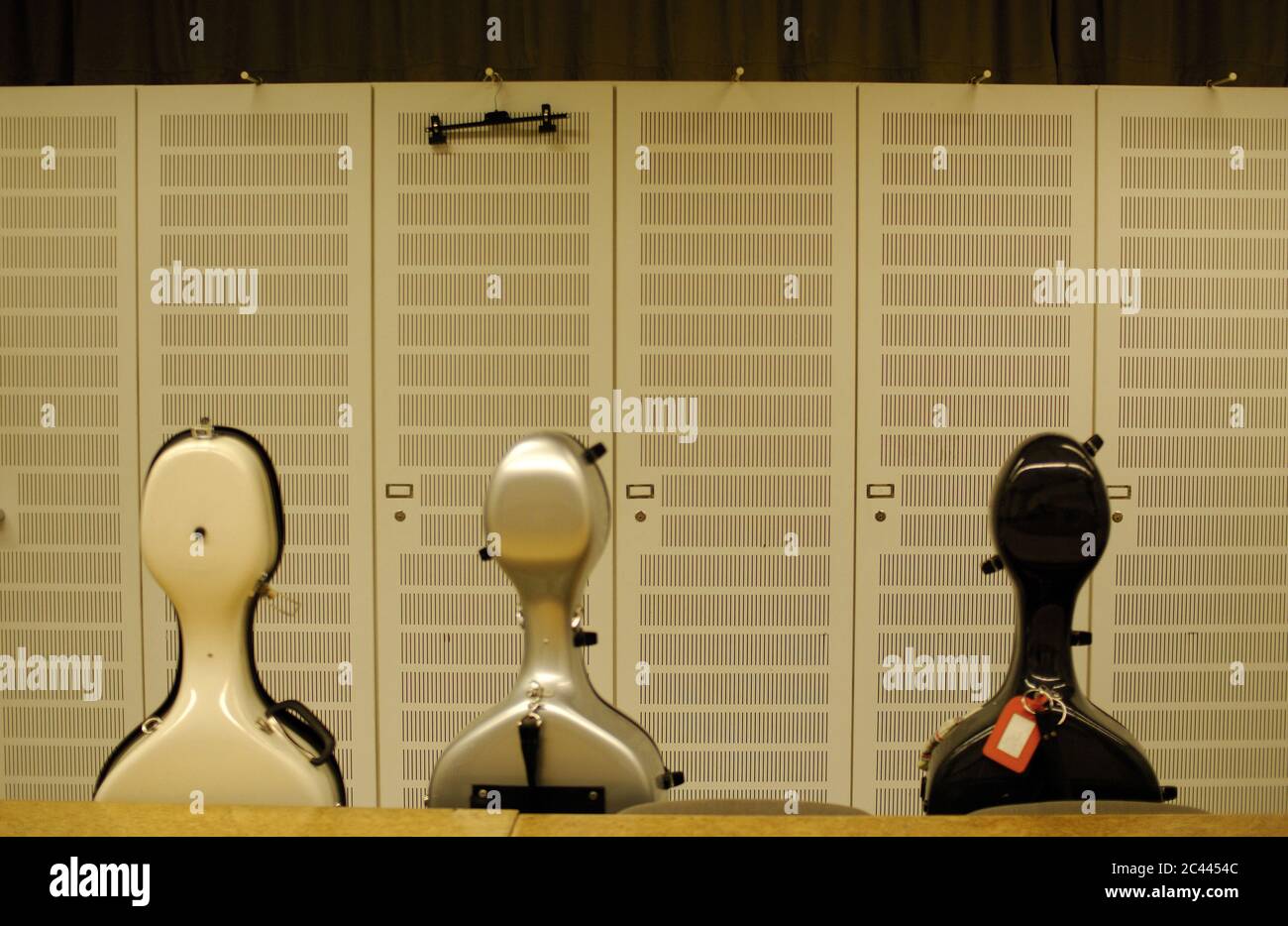 Three packaged string instruments Stock Photo - Alamy