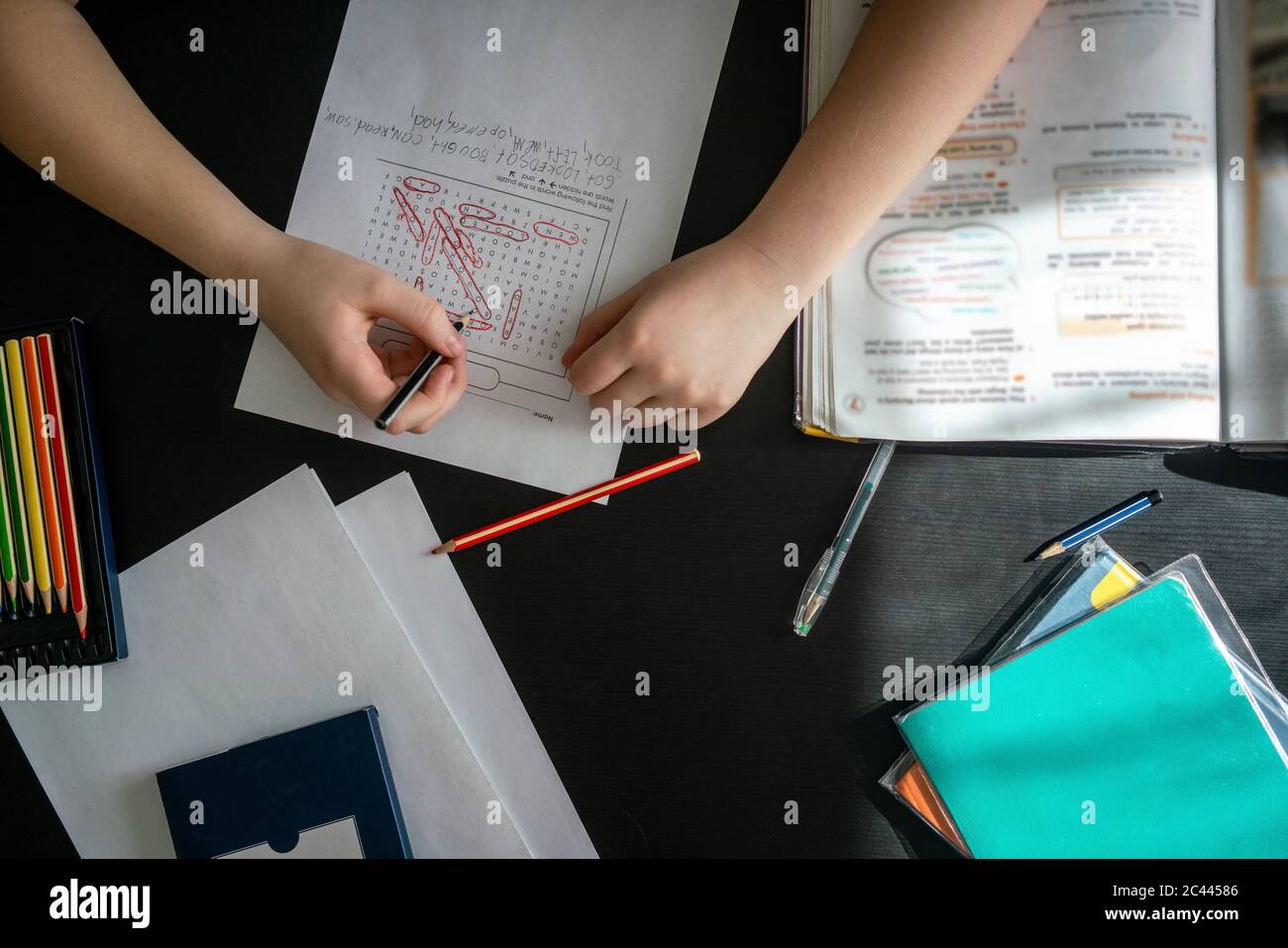 Boy doing homework for homeschooling Stock Photo - Alamy