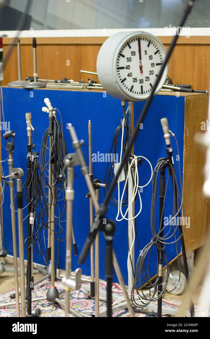 Microphones and stopwatch in a recording studio Stock Photo - Alamy
