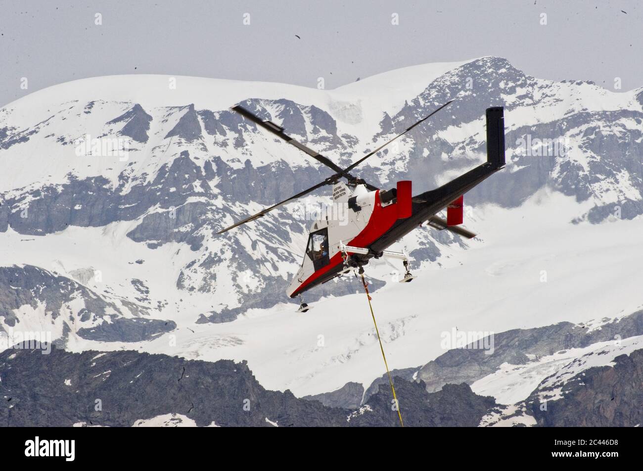 Rescue helicopter in action, Zermatt, Switzerland Stock Photo - Alamy