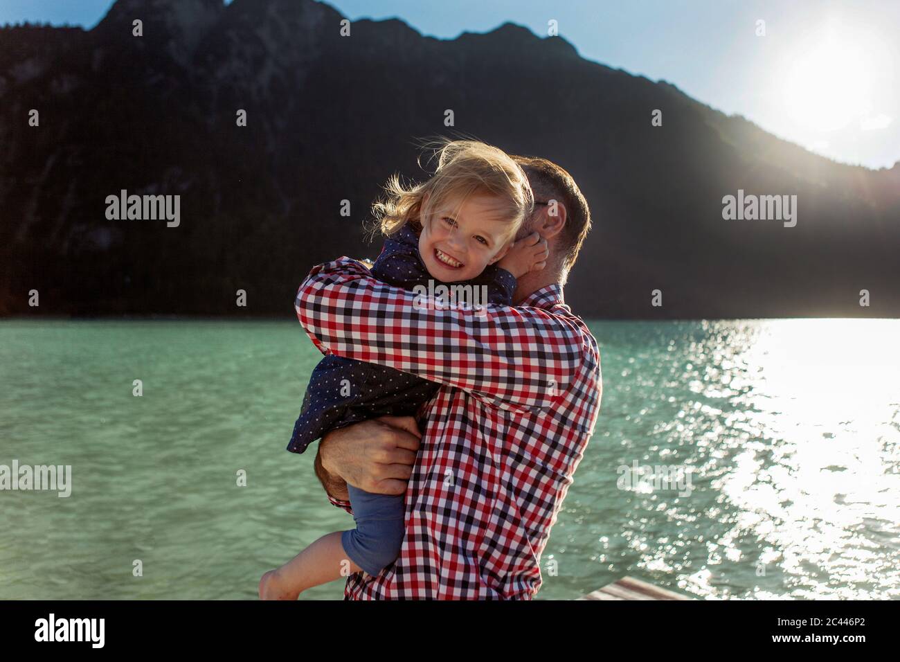 Child being carried hi-res stock photography and images - Alamy