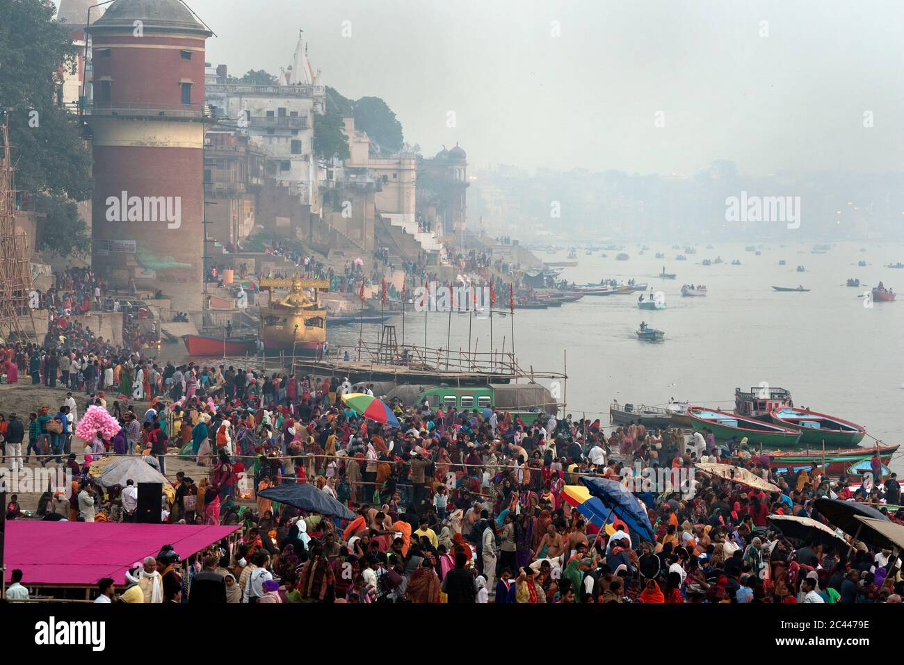 The image of Pilgrims at sunrise on the Ghats or holy steps of Varanasi ...