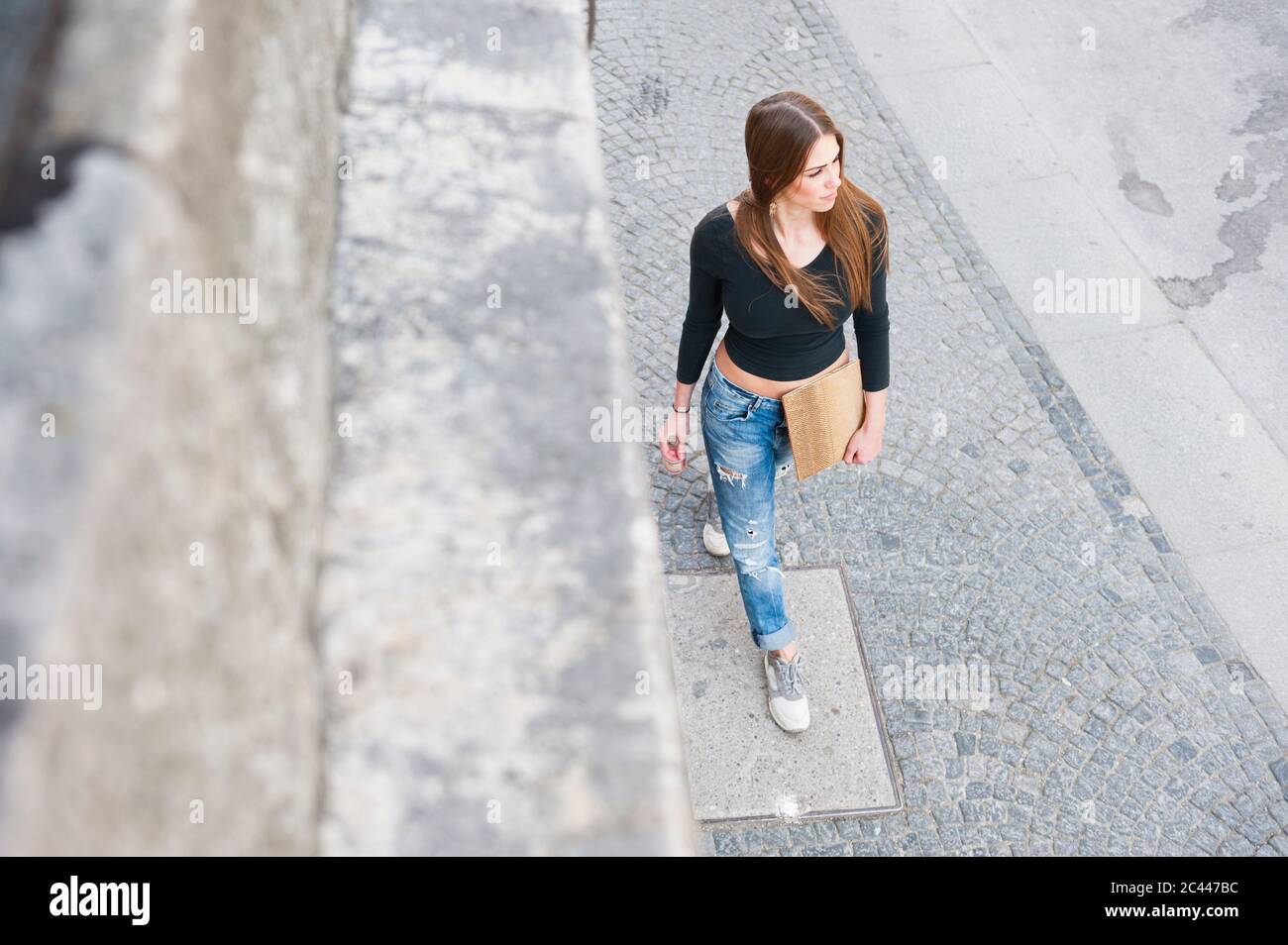 Woman walking hi-res stock photography and images - Alamy