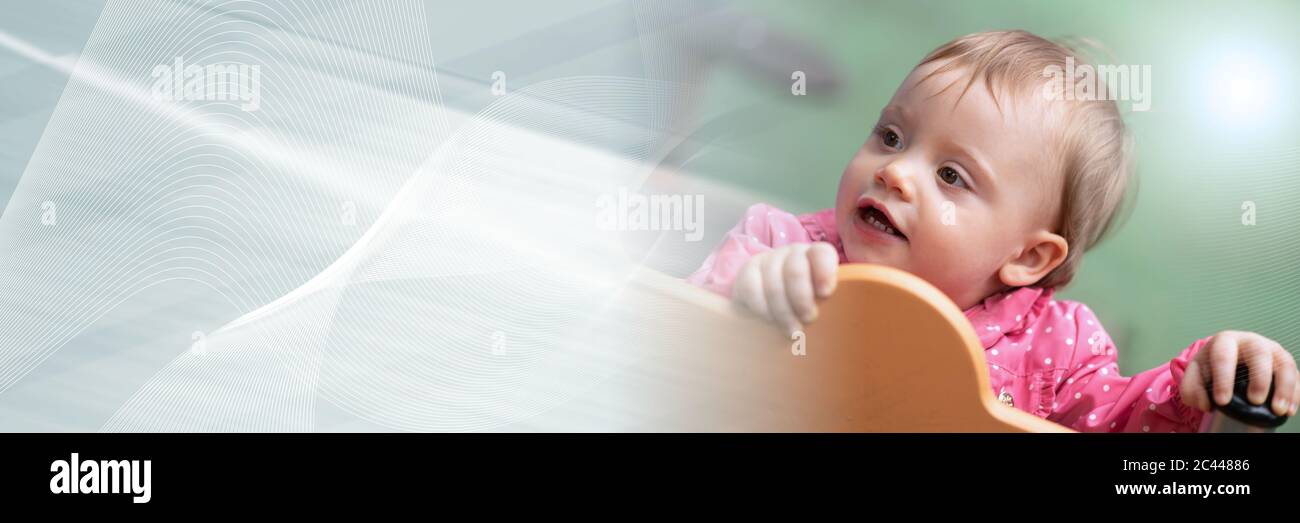 Cute baby girl having fun on a playground; panoramic banner Stock Photo ...