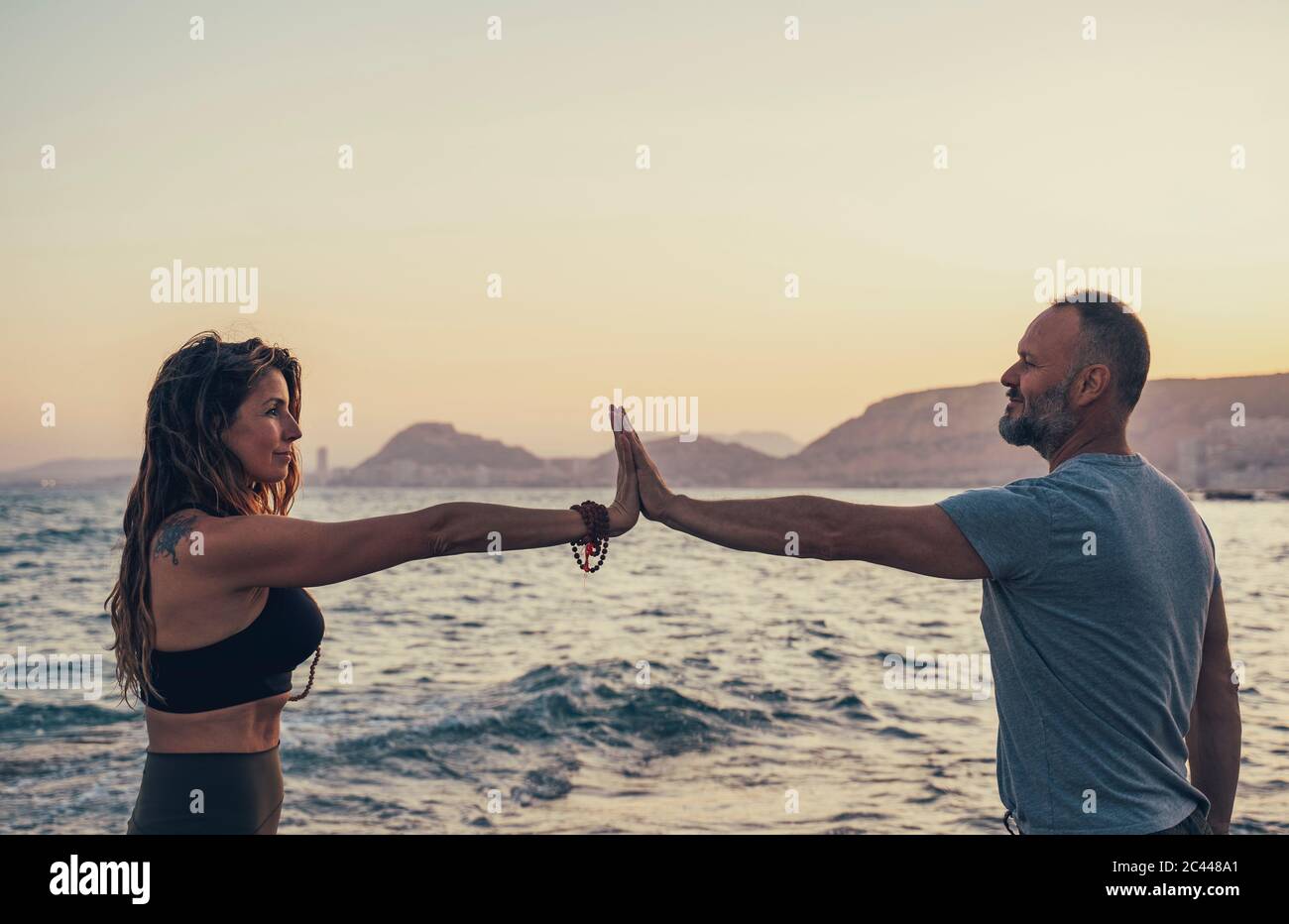 Couple touching hand hi-res stock photography and images - Alamy