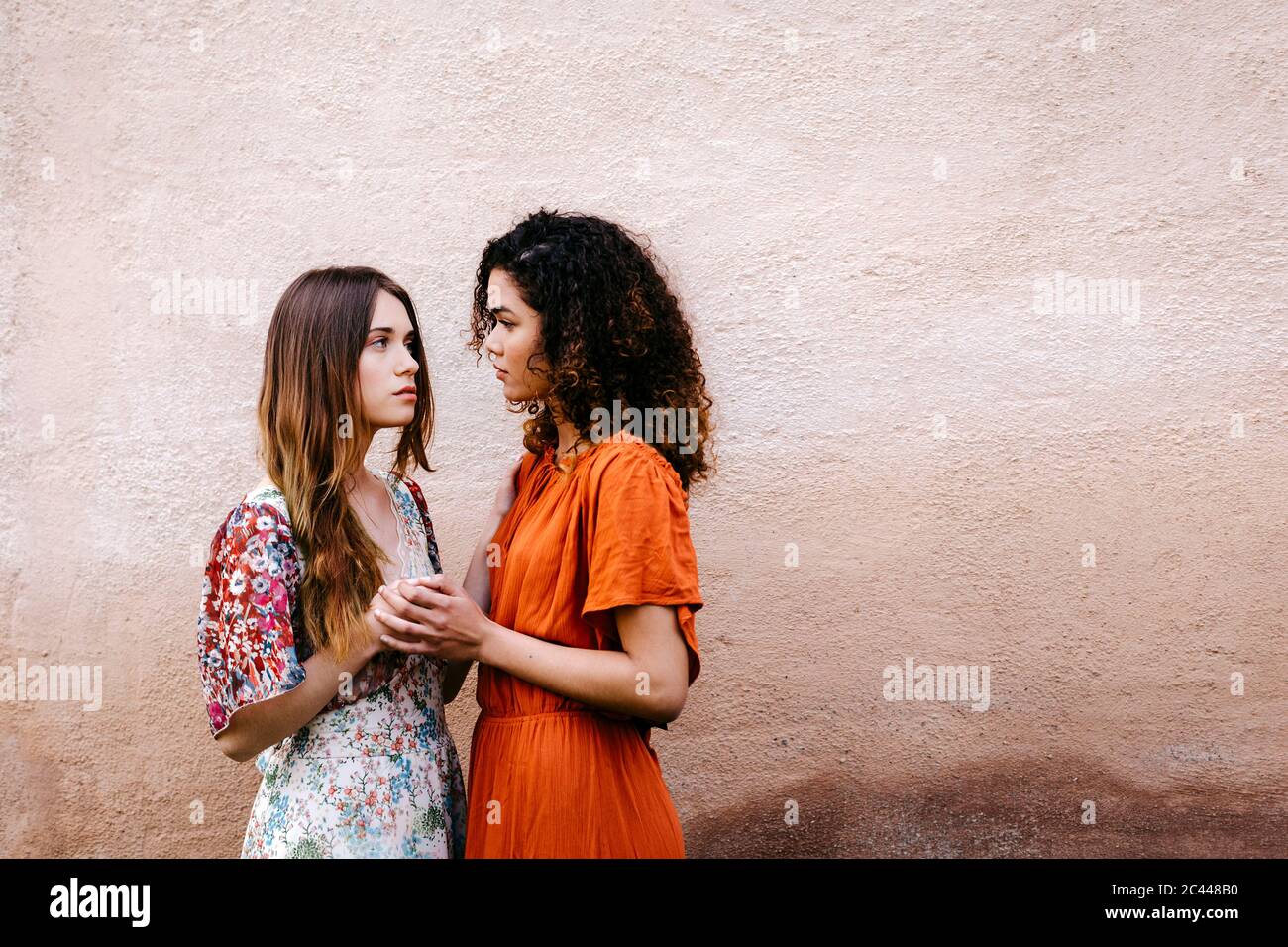 Two women touching each other hi-res stock photography and images - Alamy