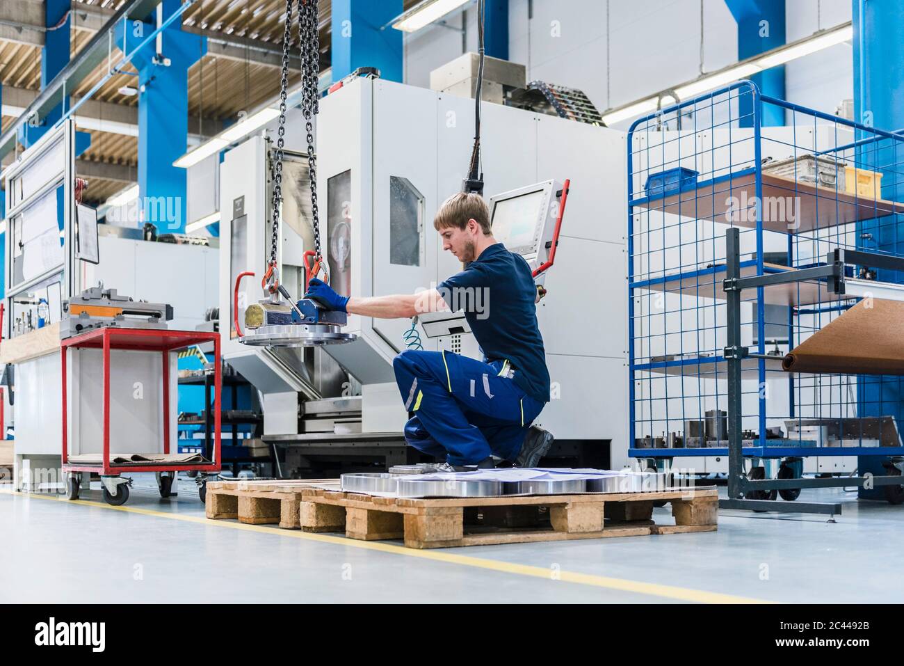 Man in crane hi-res stock photography and images - Alamy