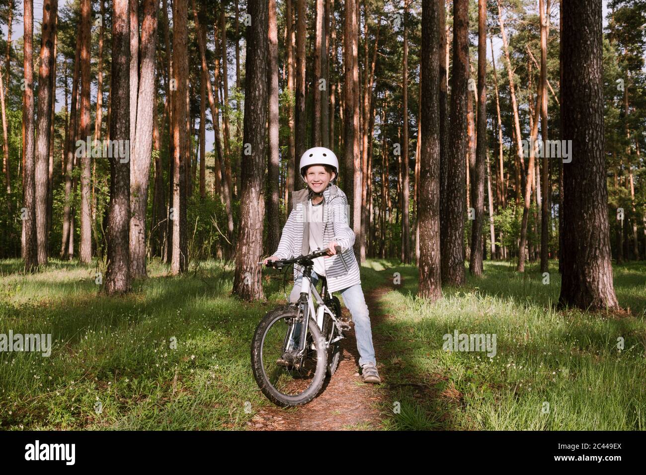 Boy and bicycle hi-res stock photography and images - Alamy