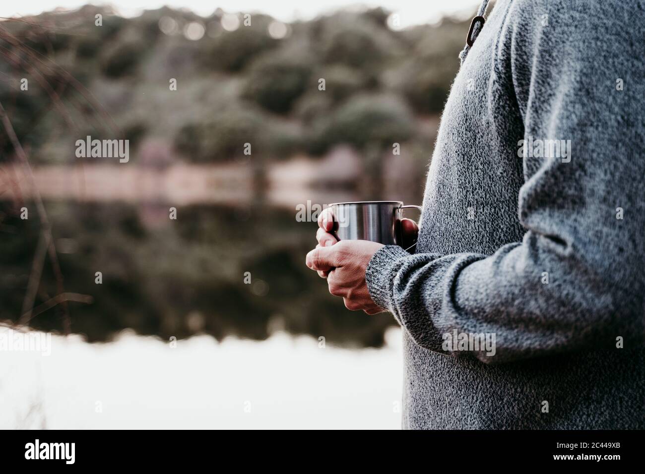 Man holding mug hi-res stock photography and images - Alamy