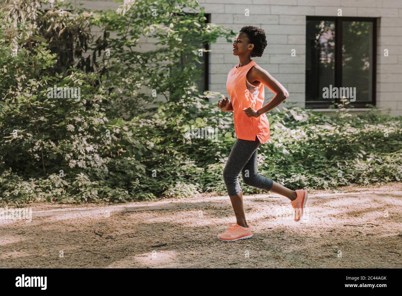 Running outdoors sport exercises woman hi-res stock photography and ...