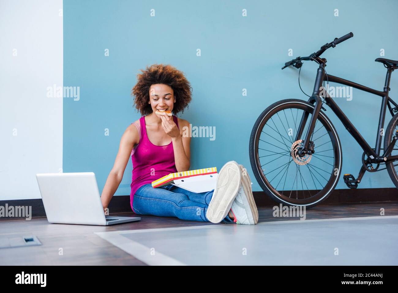 Sitting on floor eating hi-res stock photography and images - Alamy