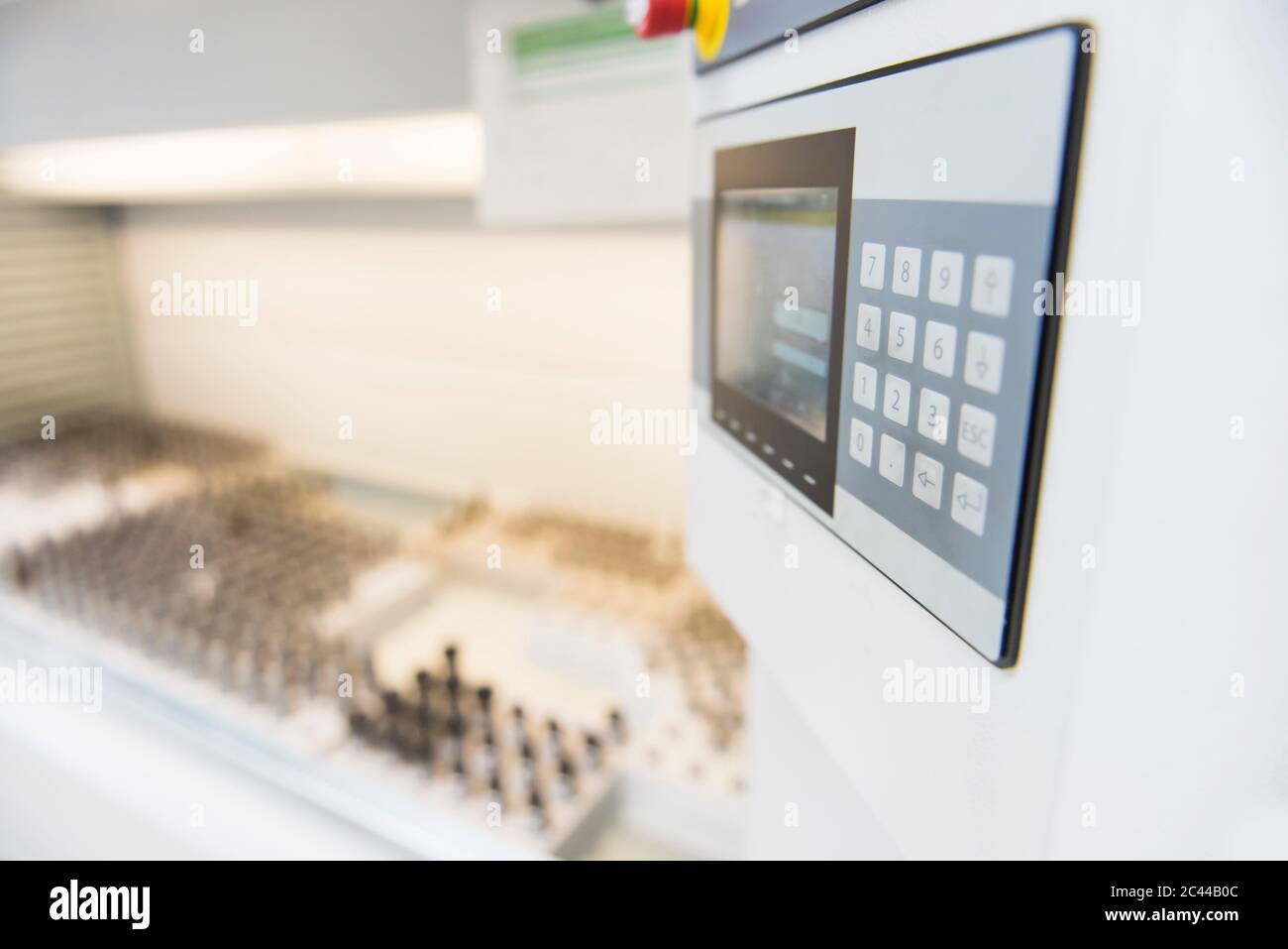 Close-up of a keypad for a machine in factory Stock Photo - Alamy