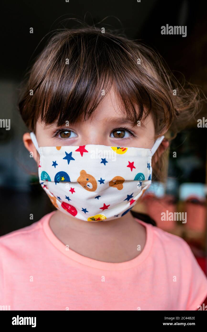 Portrait of girl with a colorful mask Stock Photo - Alamy