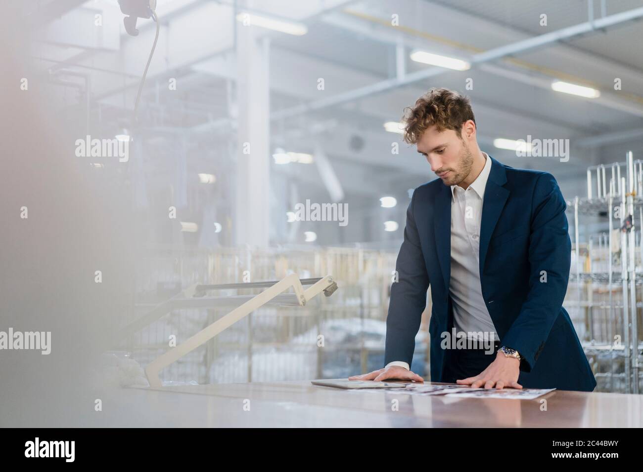 Businessman in suit papers documents hi-res stock photography and ...