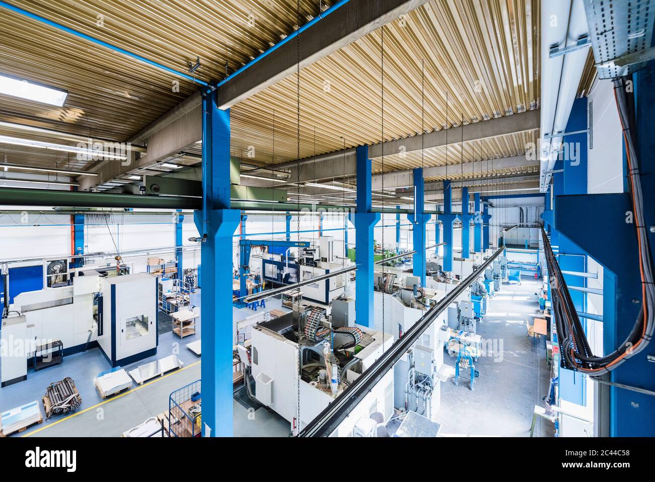 Machinery in factory shop floor Stock Photo - Alamy