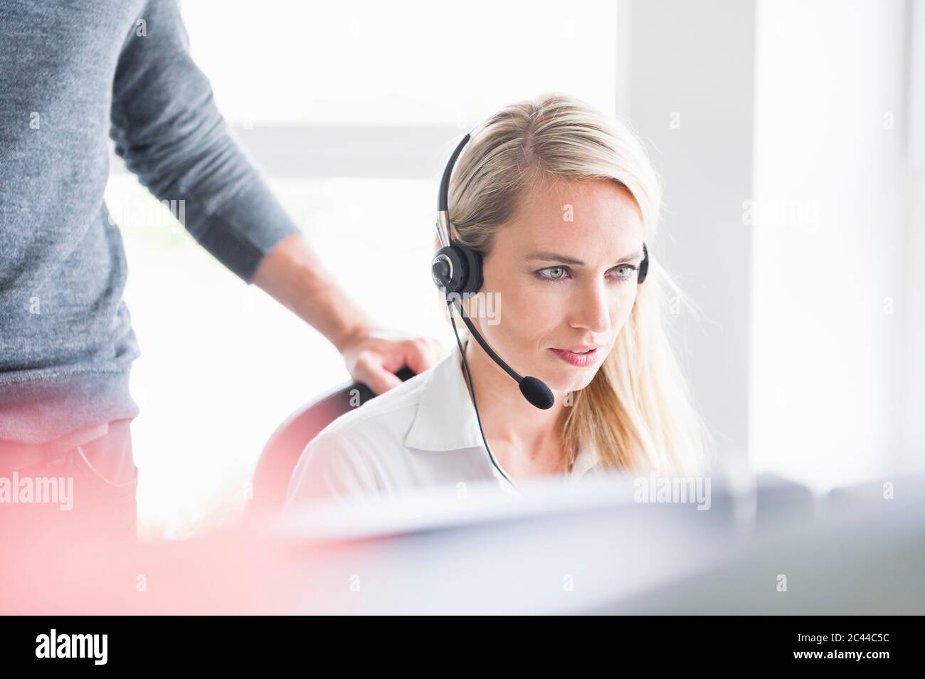 It support and female and computer hi-res stock photography and images ...