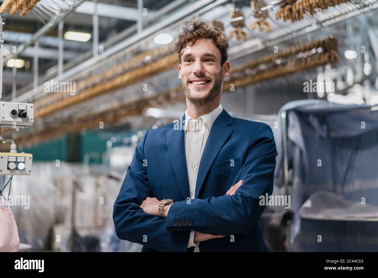 Mature businessman in a factory Stock Photo - Alamy