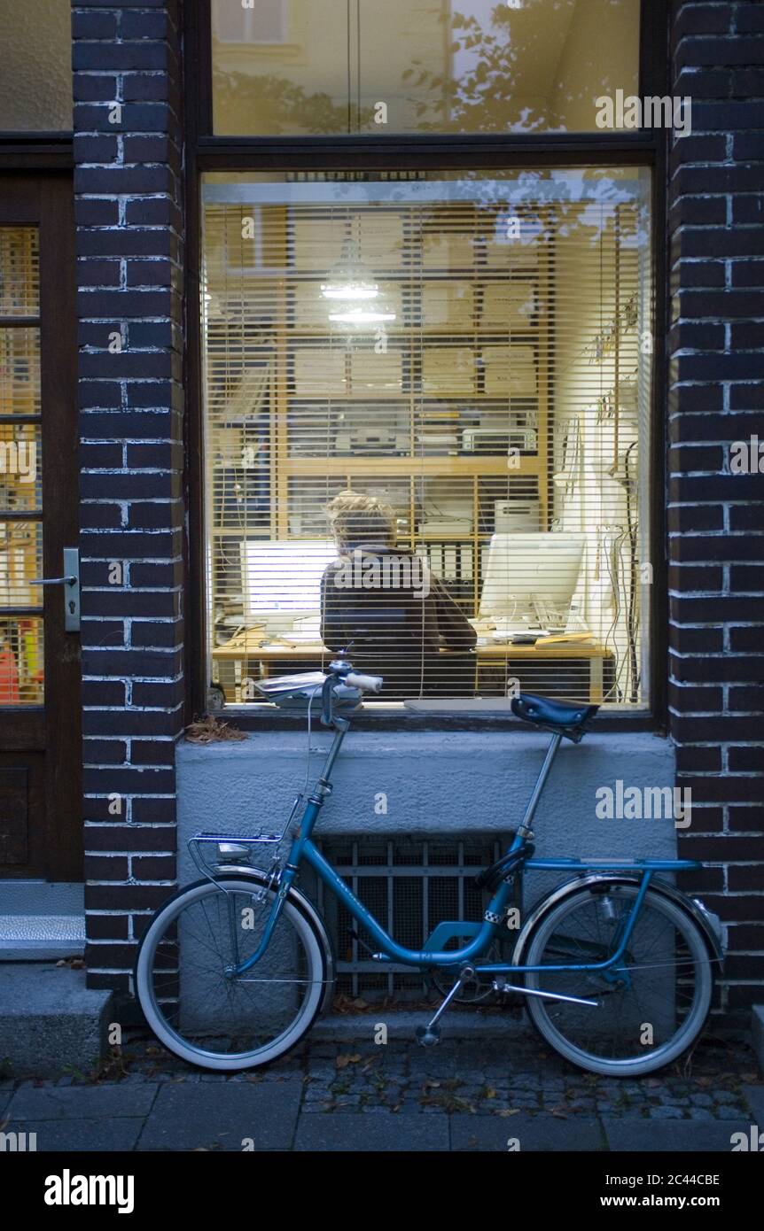 Man works behind a window Stock Photo - Alamy Man works behind a window Stock Photo - Alamy